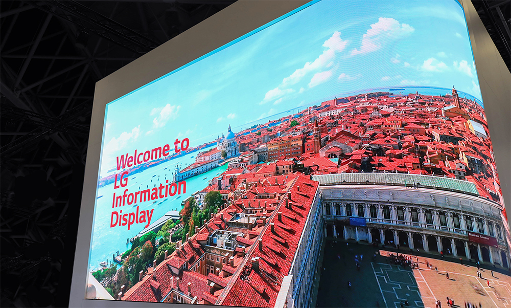 LG unveils new lightweight LED display that can wrap around ...